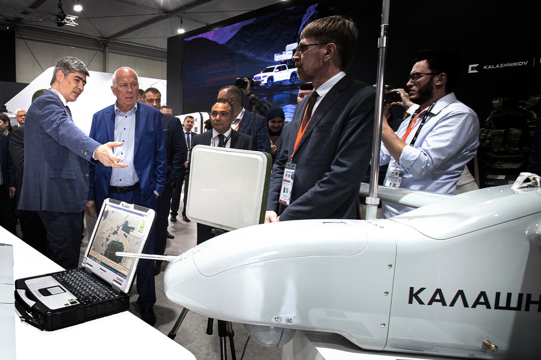 Sergey Chemezov, Head of Rostec, visits the Kalashnikov's stand at IDEX ...